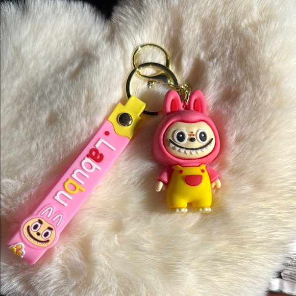 Toys | Nwot Pink And Yellow Keychain Toy | Poshmark